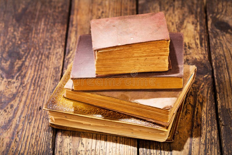 Old books on a table stock image. Image of knowledge - 76447205