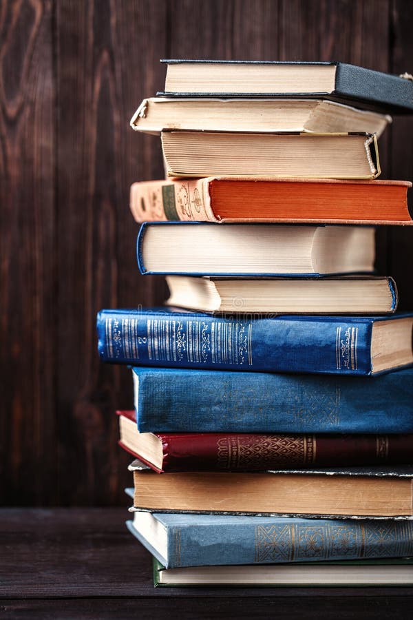 Old Books on Wooden Background. the Source of Information. Books Indoor ...