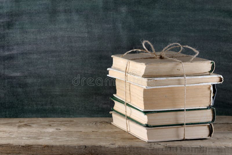Old books on table stock image. Image of heap, volume - 29337435
