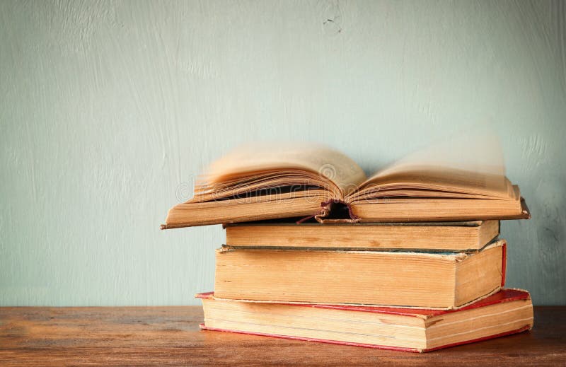 Old Books on a Wooden Table. Retro Filtered Image Stock Photo - Image ...