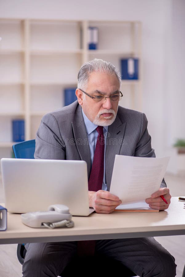 Old Male Employee Working in the Office Stock Image - Image of document ...