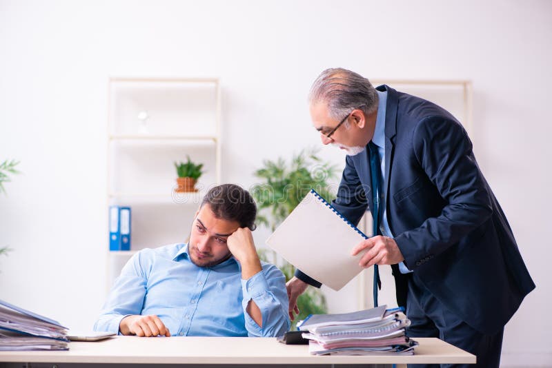 Old Boss and His Young Assistant in the Office Stock Image - Image of ...