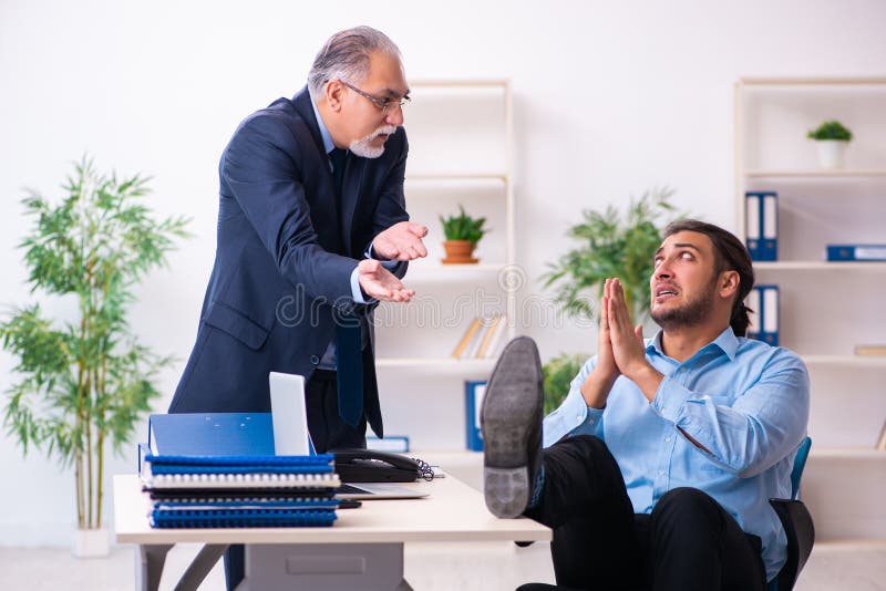 Old Boss and His Young Assistant in the Office Stock Photo - Image of ...