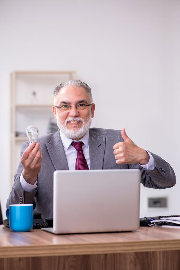 Old Male Boss Sitting at Desktop in the Office Stock Photo - Image of ...