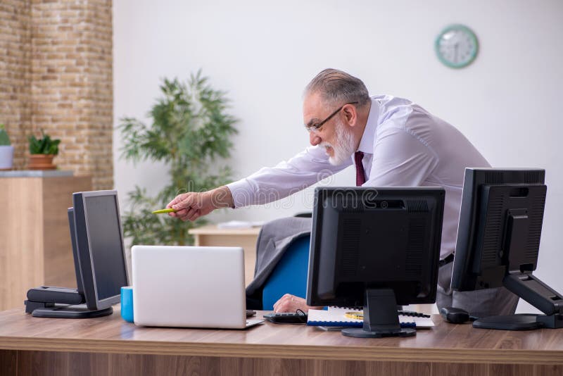 Old Male Boss Sitting at Desktop in the Office Stock Image - Image of ...