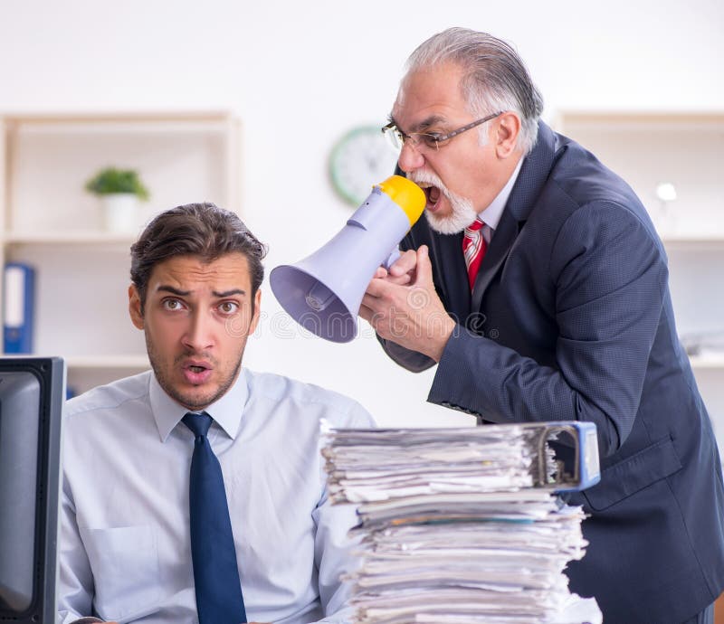 Old Boss and Young Male Employee in the Office Stock Image - Image of ...