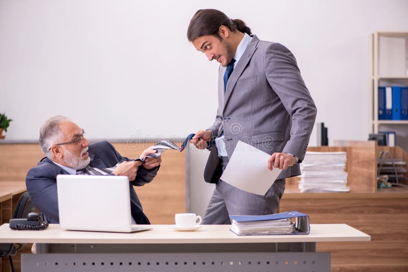 Old Boss and Young Male Assistant in the Office Stock Photo - Image of ...