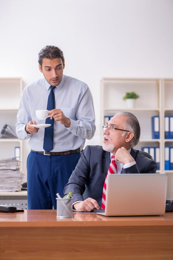 Old Boss and Young Male Employee in the Office Stock Photo - Image of ...