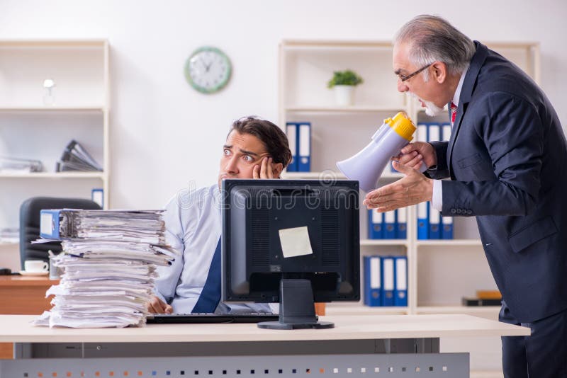 Old Boss and Young Male Employee in the Office Stock Image - Image of ...
