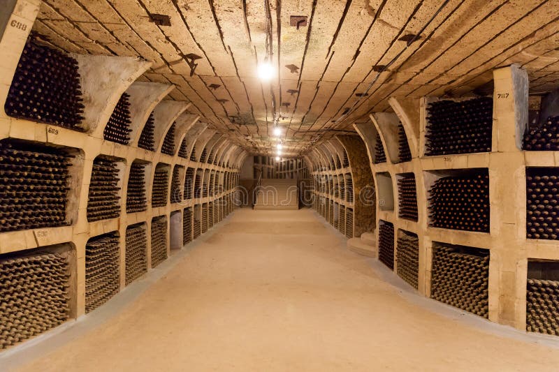 Old Bottles of Wine Stacked in Rows Stock Photo - Image of stacked ...