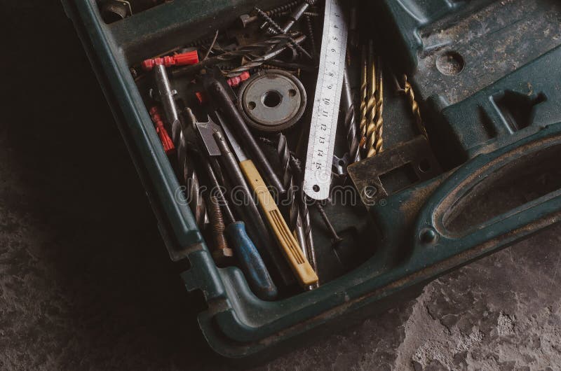 Old Box with Drills, a Ruler and Screws Stock Photo - Image of ...