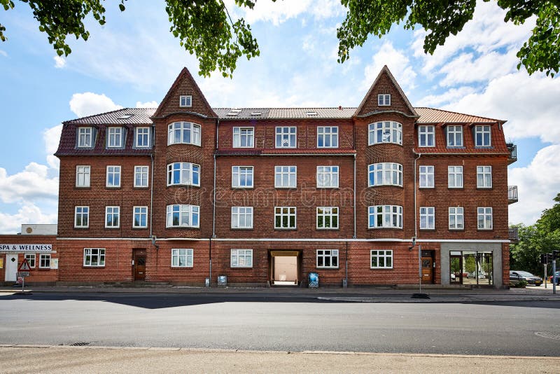 Old Brick Building with Small Condos in Denmark Editorial Photo - Image ...