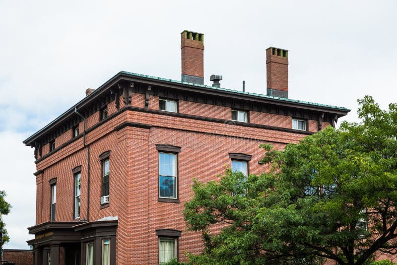 Old Brick Building with Two Chimneys Stock Photo - Image of wall ...