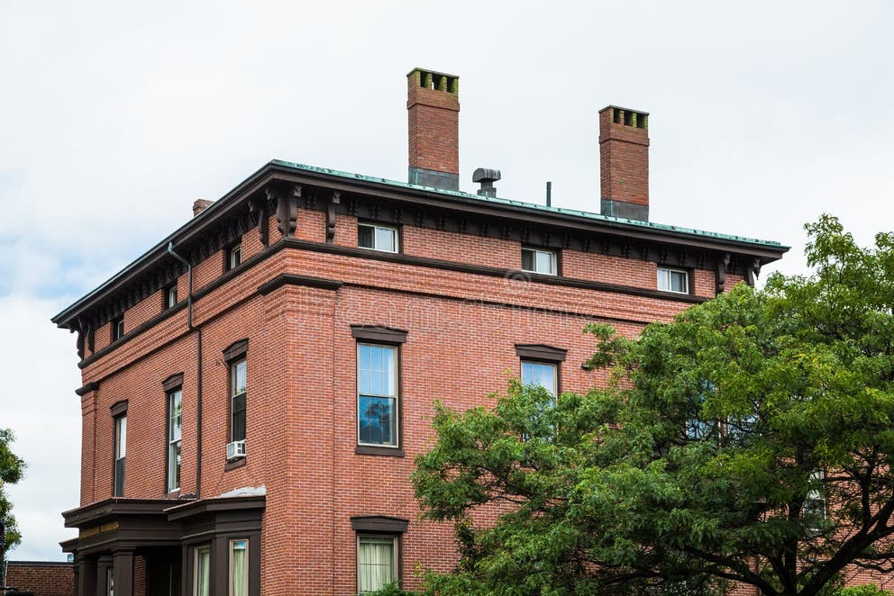 Old Brick Building with Two Chimneys Stock Photo - Image of wall ...