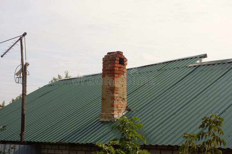 Old Brick Chimney on the Roof of a House Stock Image - Image of heating ...