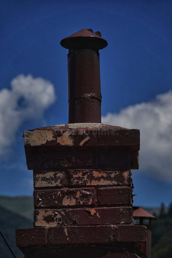 Old Brick Chimney on a Rooftop of a House in Sinaia Stock Photo - Image ...