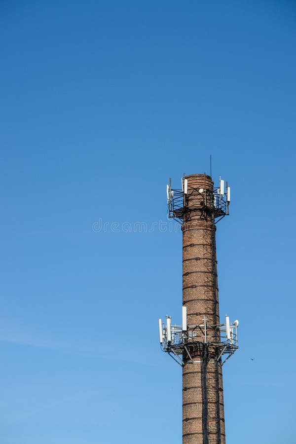 Old Brick Chimney Turn into Cellular Tower. Stock Photo - Image of ...