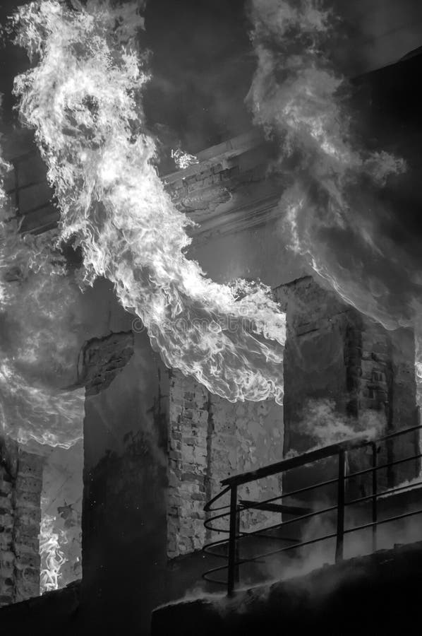 Old brick house on fire stock image. Image of flame, tongue - 49112477