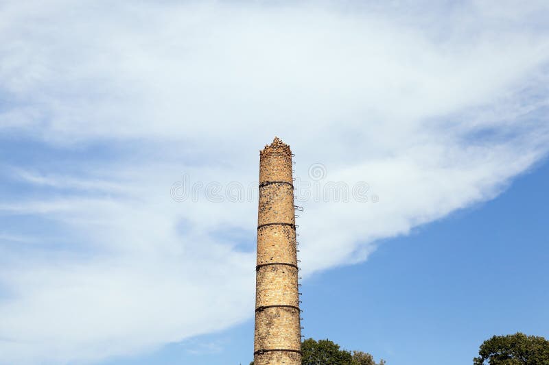 Old brick pipe stock image. Image of high, blue, orange - 70581375