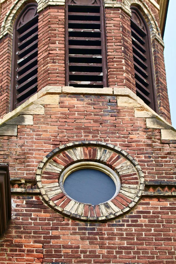 Old Brick Tower with Round Window Stock Photo - Image of cityscape ...
