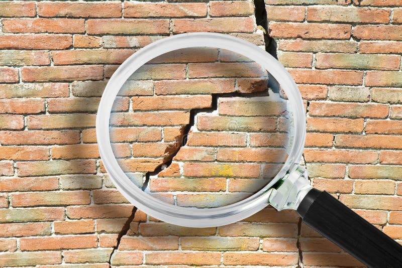 Old Brick Wall Cracked and Damaged with a Diagonal Deep Crack- Concept ...