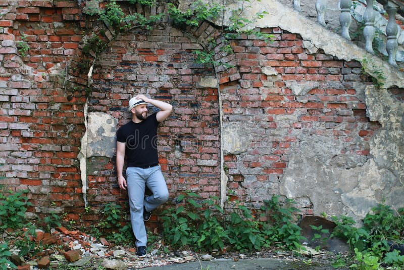 Old brick wall man stand stock image. Image of city, castle - 89185709