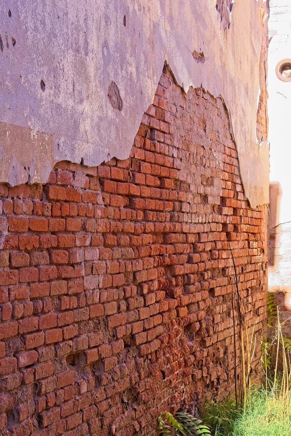 Old Brick Wall with Plaster Covering Falling Off. Stock Photo - Image ...