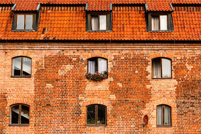 Old Brick Wall with Small Windows Stock Image - Image of apartment ...