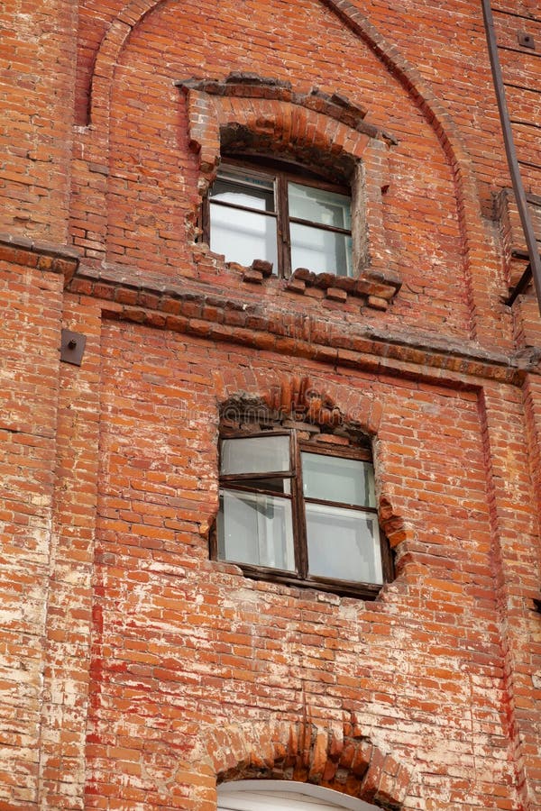 Old brick wall and windows stock photo. Image of time - 127769288