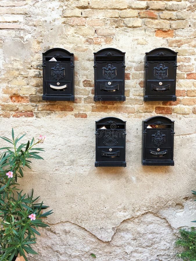 Old Bricks Wall with Ancient Post Boxes, Italy Stock Photo - Image of ...