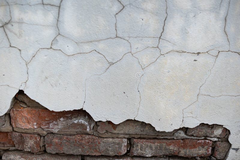 Old Brickwork and Cracked Collapsed Plaster on an Ancient Wall Stock ...