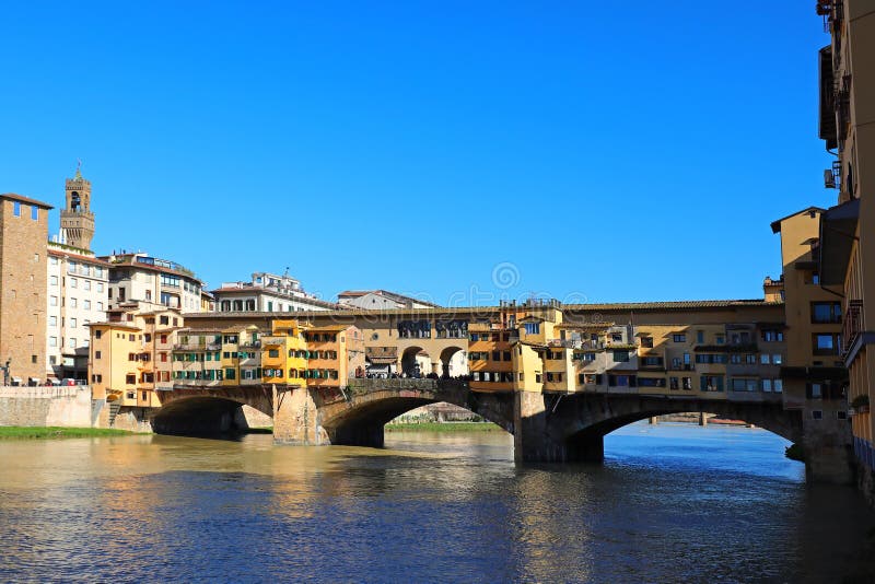 The Old Bridge Called PONTE VECCHIO in Italian and the River Stock ...
