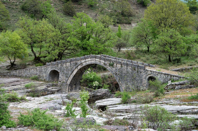 Old bridge in Greece stock image. Image of arch, mountain - 353952881