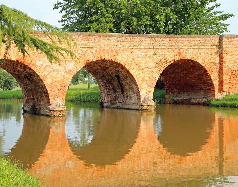 Old Bridge Made of Red Bricks with the River Stock Photo - Image of ...