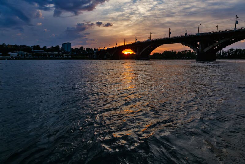 Old Bridge Over Angara River with Waves at Sunset, Sun Shining and ...