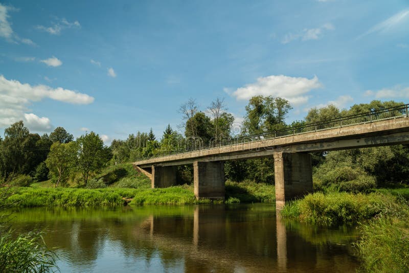 Old bridge over the river stock photo. Image of summer - 155536514