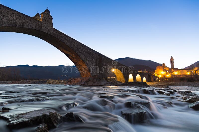Old bridge over the river stock image. Image of architecture - 48619573