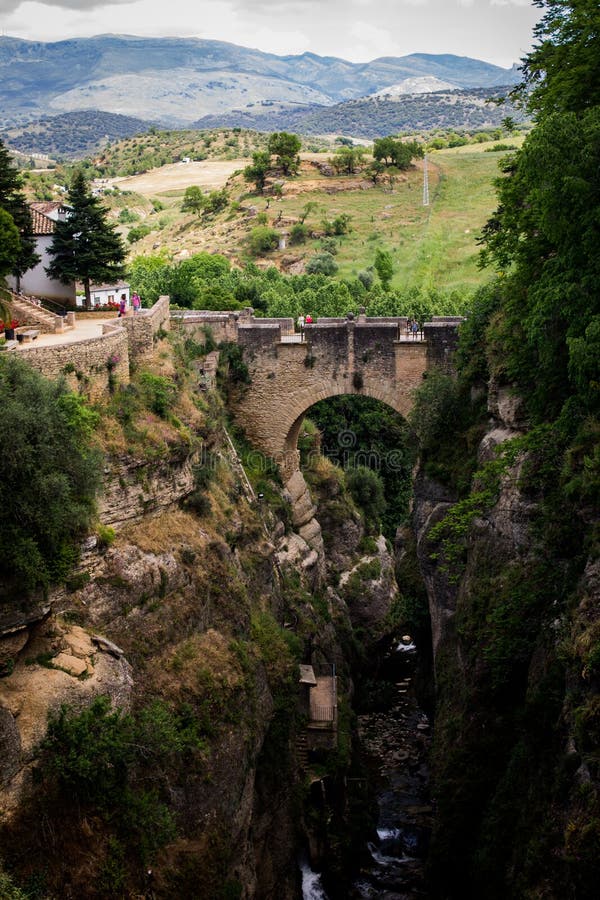 Old Bridge Ronda stock photo. Image of mountains, green - 125992832