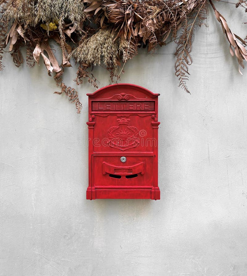 An Old British Classic Red Mailbox on a White Wall Stock Image - Image ...