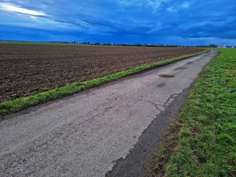 Old Broken Asphalt Road in the Fields Stock Photo - Image of lane ...