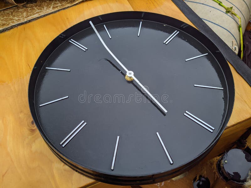 Old and Broken Black Clock in a Garbage Dump in a Rainy Time. Stock ...