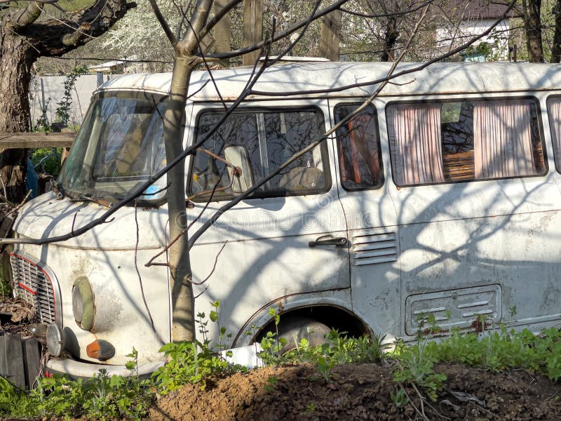 Old Broken Bus at a Car Dump Stock Image - Image of broken, obsolete ...