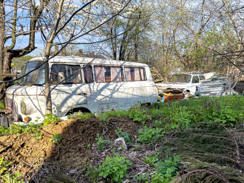 Old Broken Bus at a Car Dump Stock Photo - Image of auto, mishap: 219538136