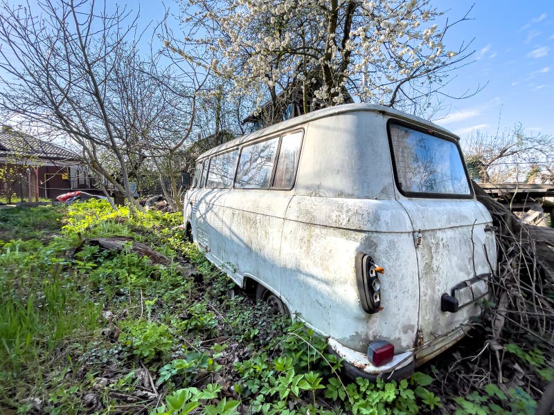 Old Broken Bus at a Car Dump Stock Photo - Image of graveyard, iron ...