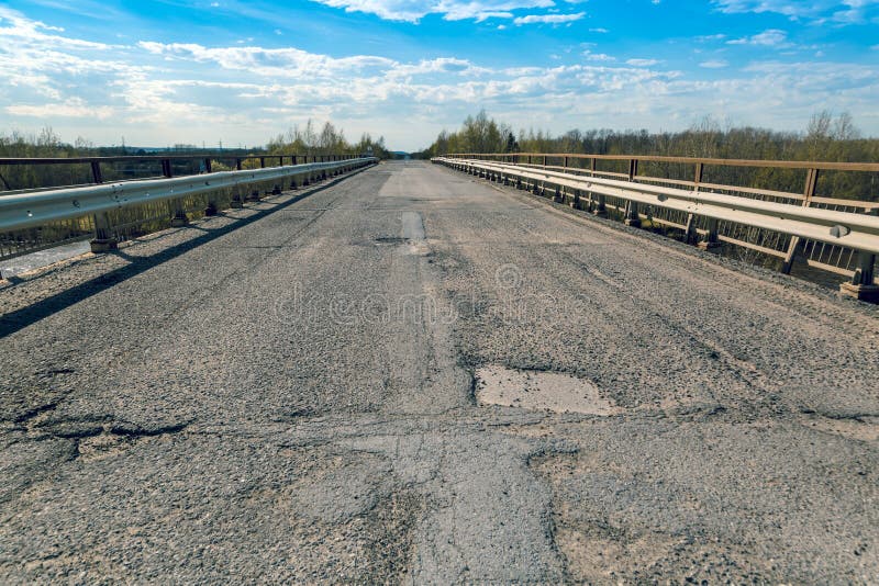 Broken Concrete Road on the Bridge Over the River Stock Image - Image ...