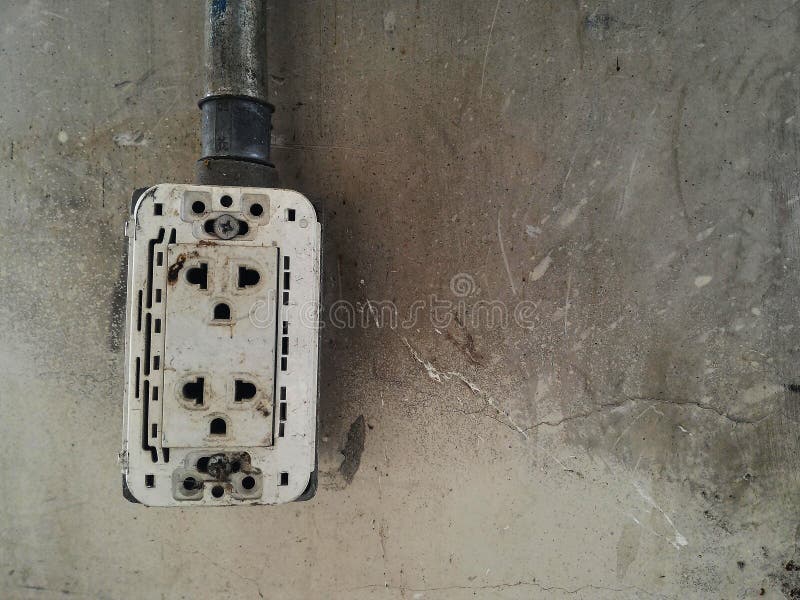 Old Broken Electric Socket on Dirty Cement Wall Stock Image - Image of ...
