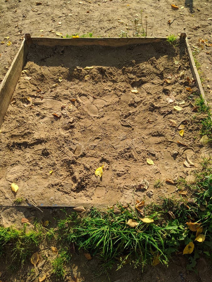 Old Broken and Grassy Children S Sandbox Stock Photo - Image of sandbox ...