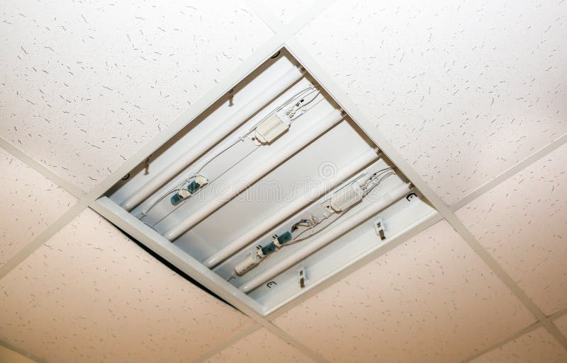 The Construction Of The Ceiling, A Broken Ceiling Lamp Stock Photo ...