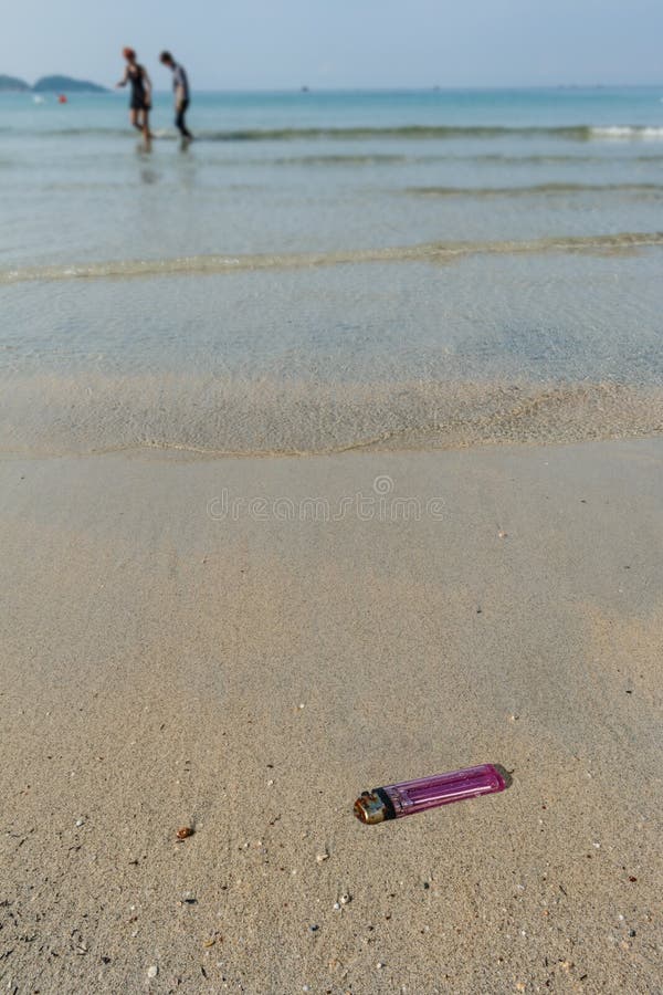 Old Broken Lighter Polluting Beach Stock Photos - Free & Royalty-Free ...