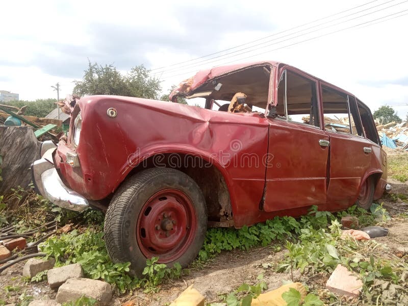 Old Broken Red Car, Crashed and Abandoned Car after an Accident Stock ...